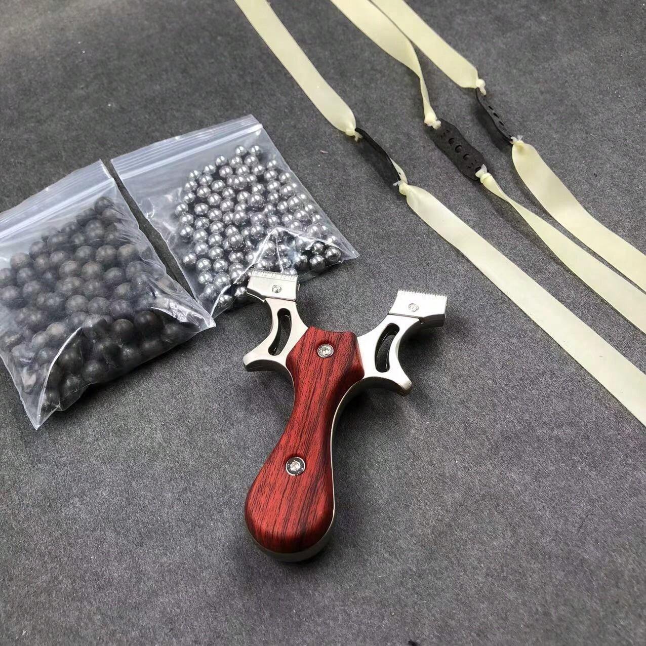 1 pieza Resortera que incluye 3 bandas elásticas, 1 bolsa de bolas de ...