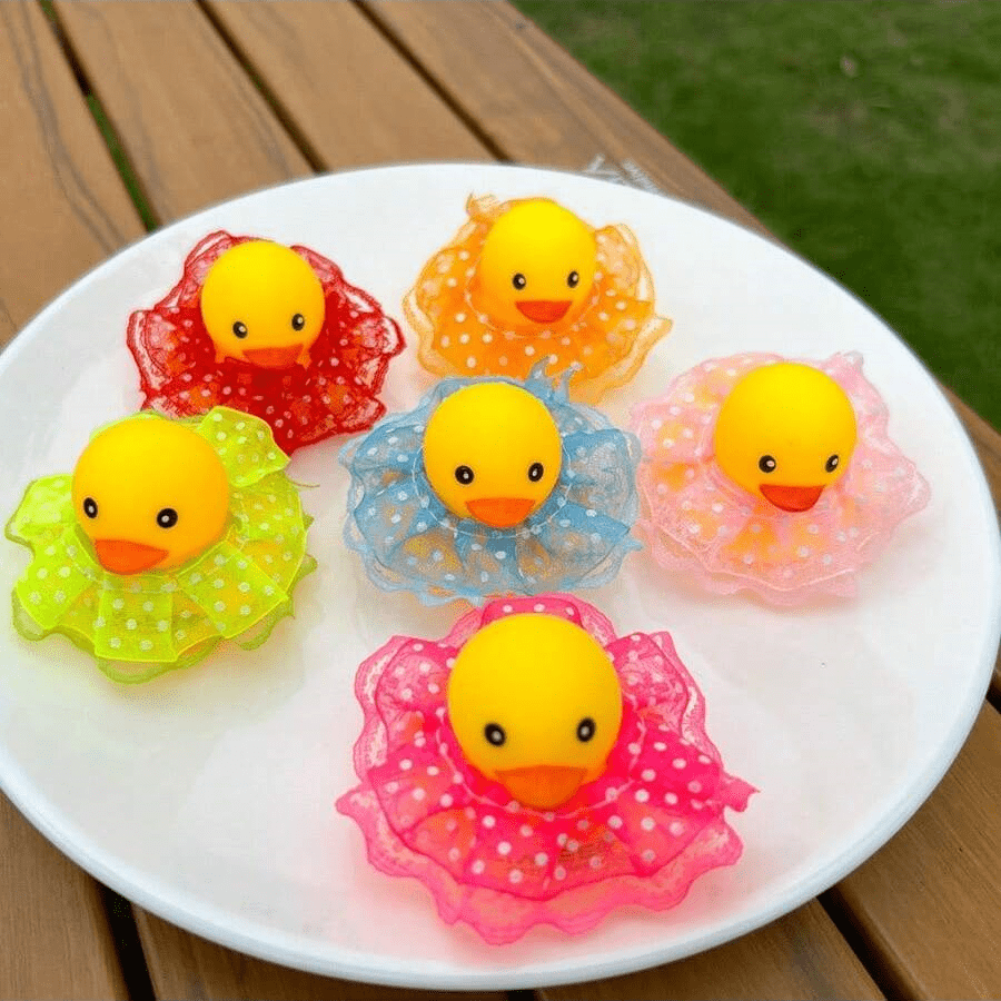 A Small Duck Model With A Wreath, Pinched And Called A Bath Toy, A ...