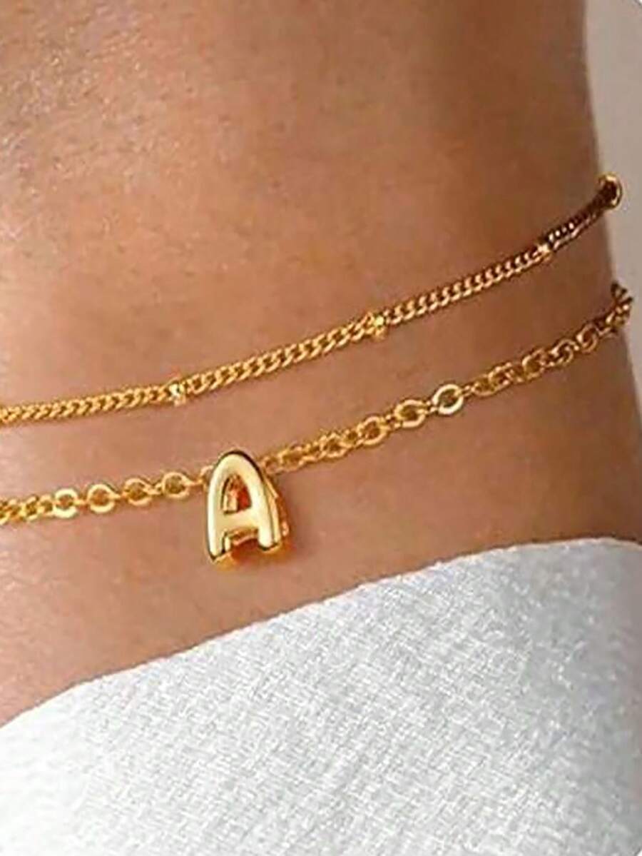 26 Gold Bubble Letters Paired With Double-Layer Gold Shaped Chains Are ...