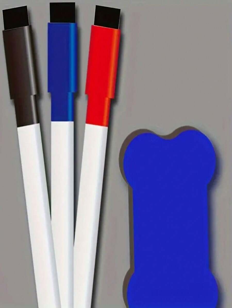 Un blocco note magnetico piccolo con tre penne, una gomma da cancellare ...