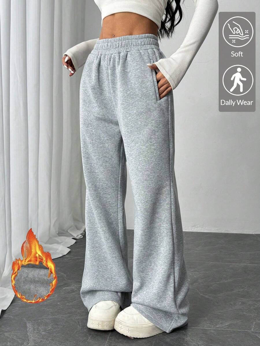 Women's Casual Solid Color Elastic Waist Pocket Loose Flared Pants ...