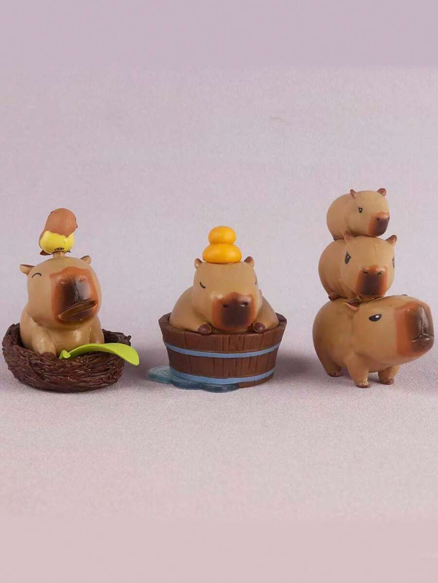 Un pack de boîtes surprise de poupées capybaras aux styles aléatoires ...