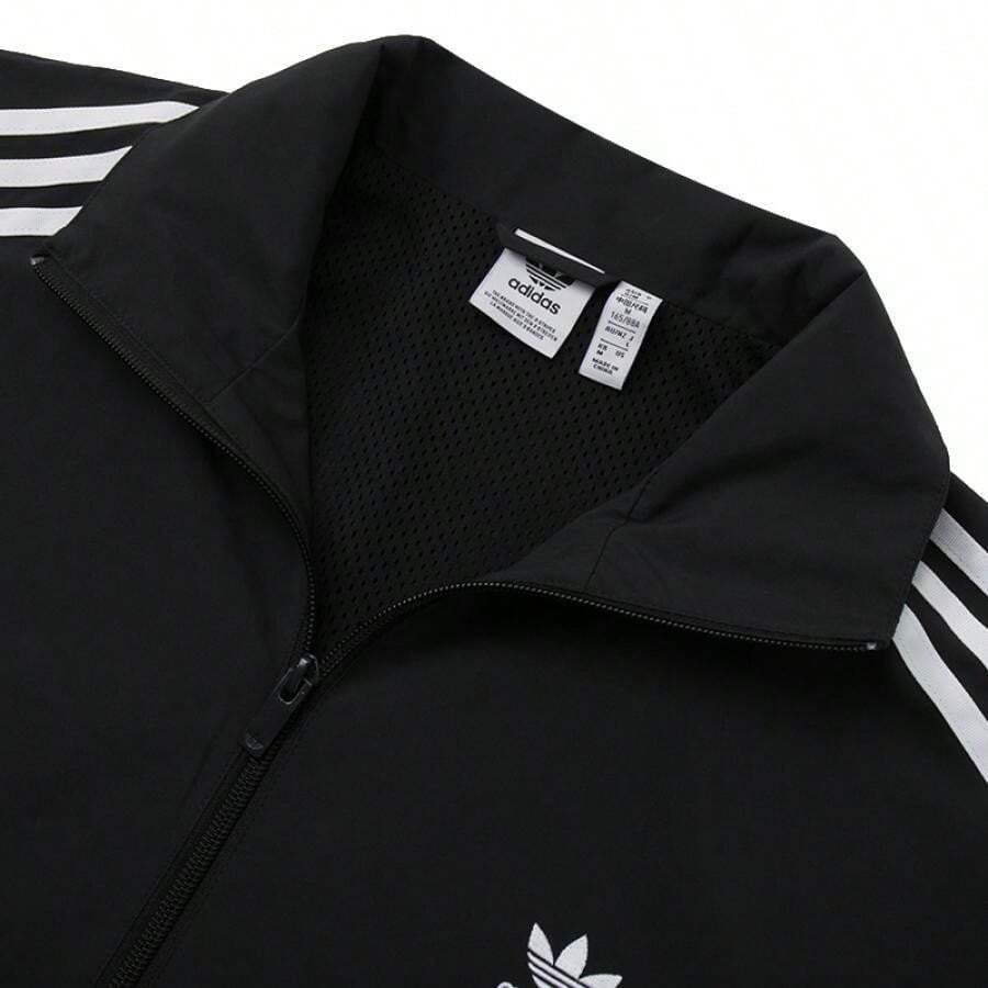 Adidas Chaqueta con cuello alto y resistente al viento de estilo ...