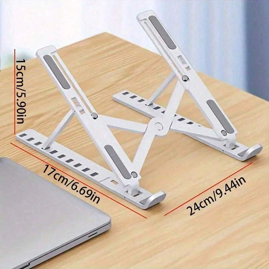 An Adjustable ABS Laptop Desktop Stand - Portable And Foldable Laptop ...