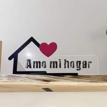 A Heart-Shaped Sign In Spanish Featuring An Artistically Crafted ...