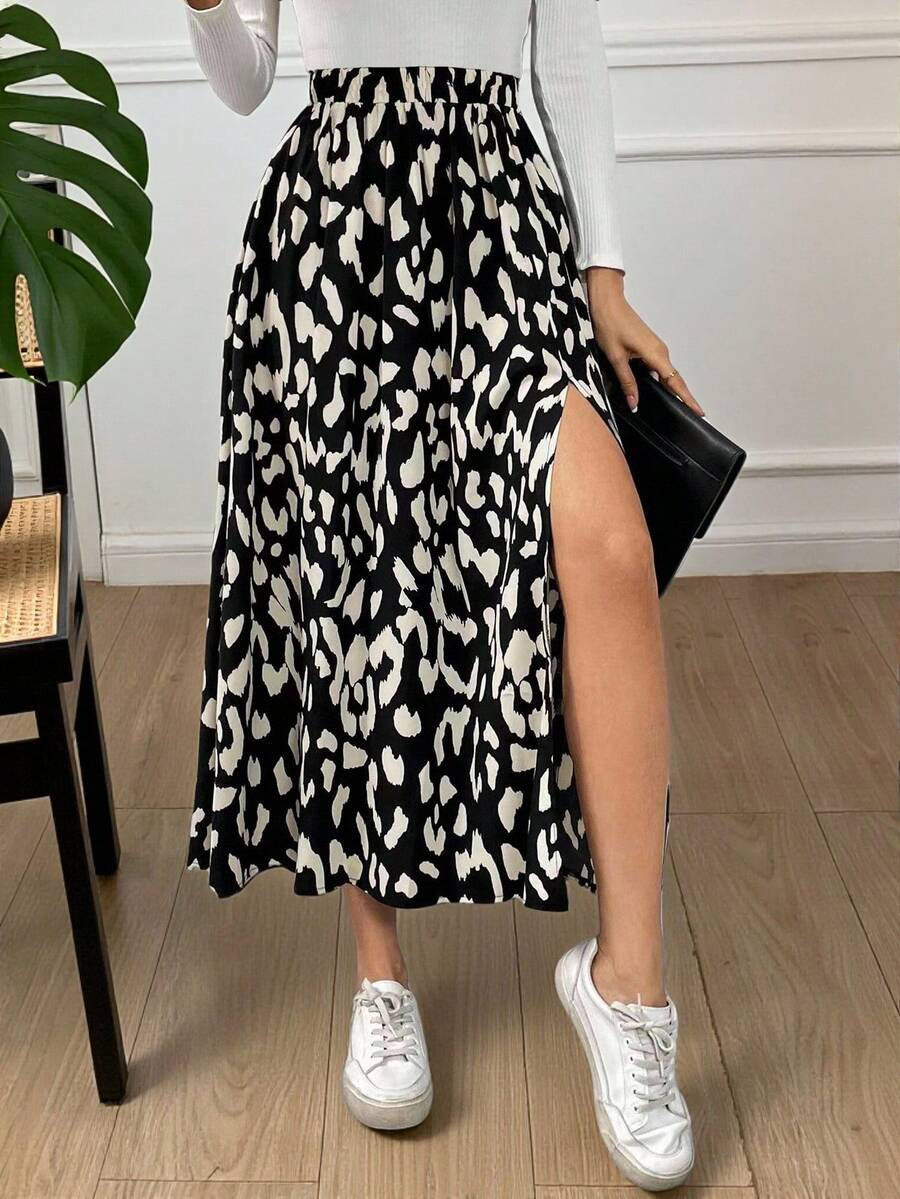 SHEIN Schwarz-weißer Rock mit geteiltem Saum und Leopardenmuster für ...