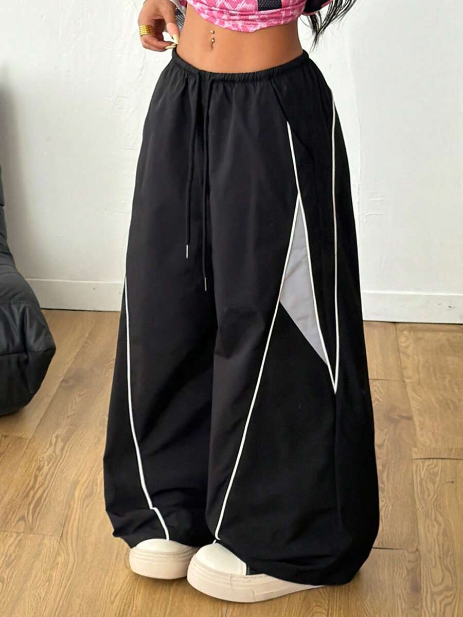 Coolane Pantalones anchos de color negro con bloques de color para ...
