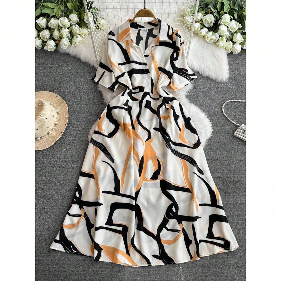 A V-Neck Dress With All-Over Prints And Color-Blocking Design Featuring ...
