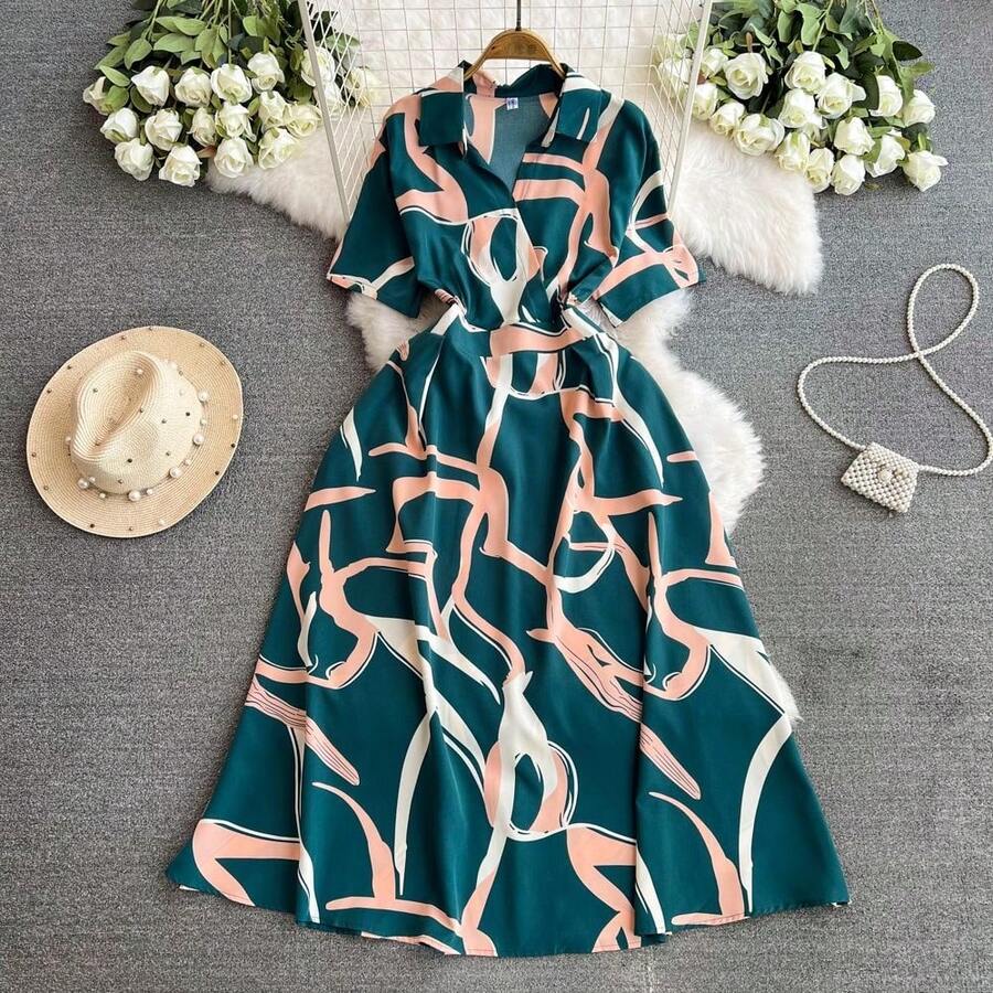 A V-Neck Dress With All-Over Prints And Color-Blocking Design Featuring ...