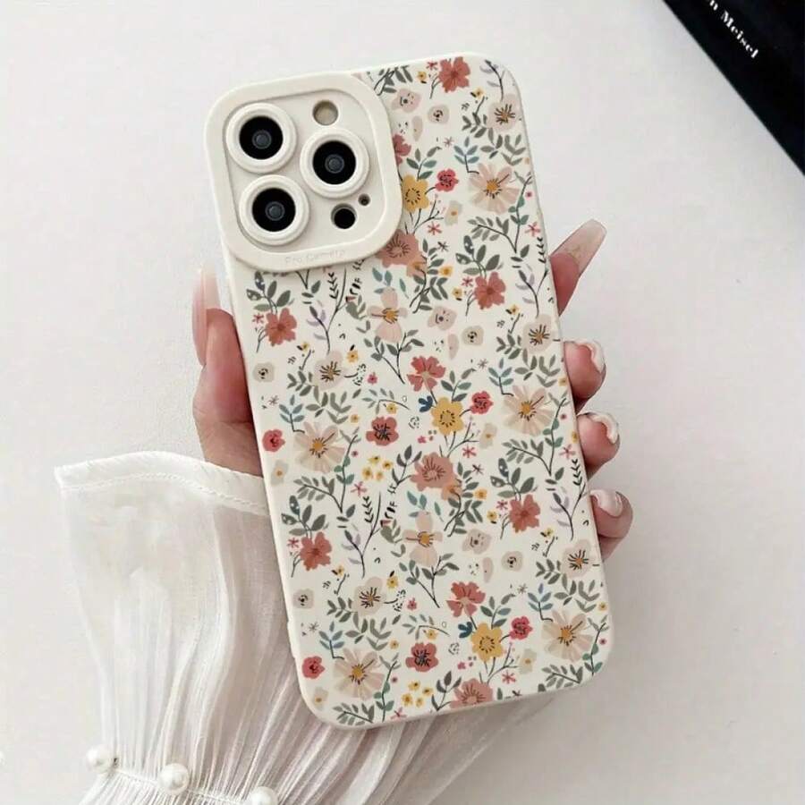 A Phone Case With A White-Eyed Design Featuring Colorful Floral ...
