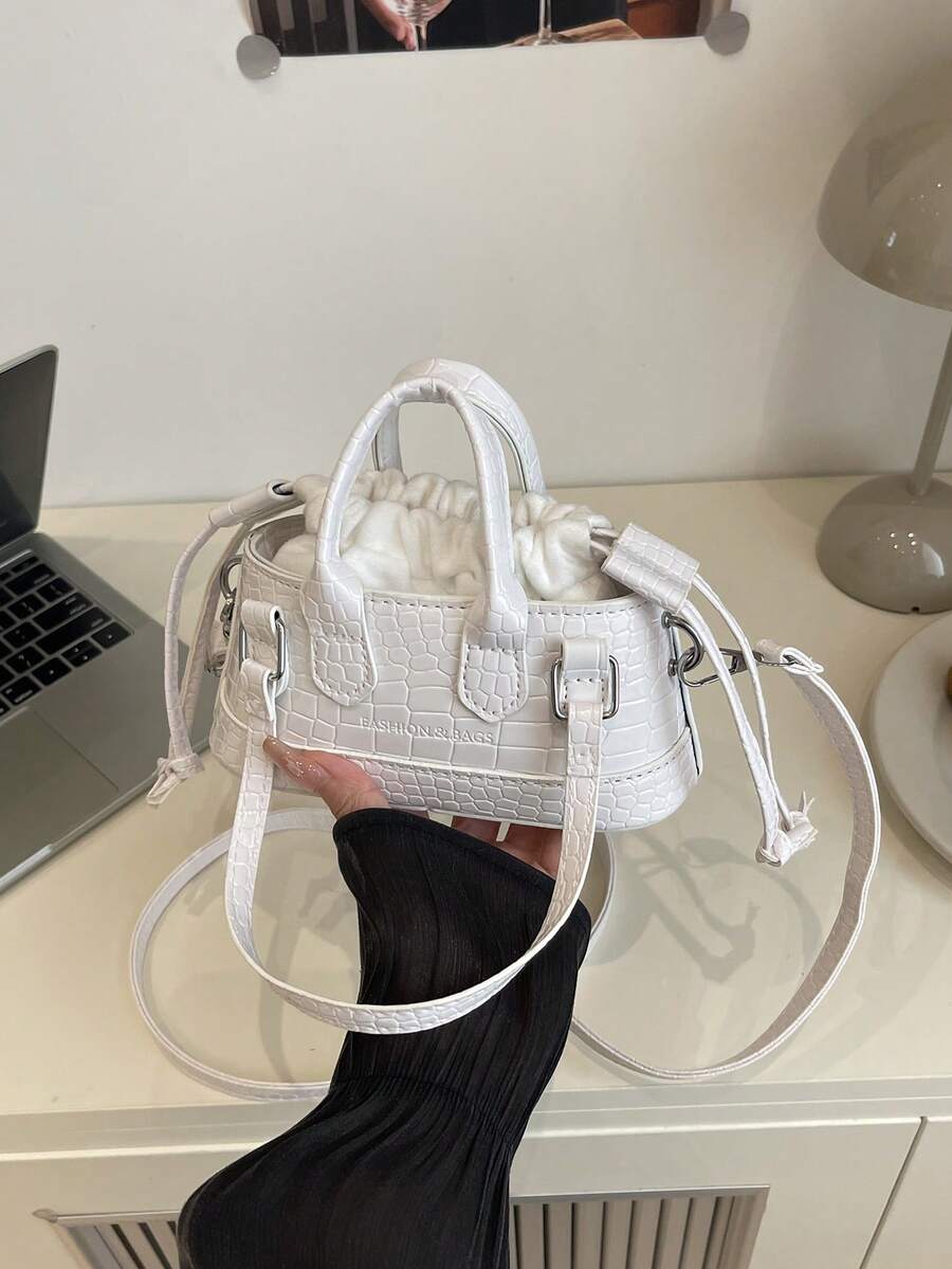 Borsa a mano e borsa a tracolla mini con stampa effetto coccodrillo ...