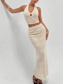 Conjunto de Top Cropped de Malha Oca com Anel Metálico e Mini Saia ...